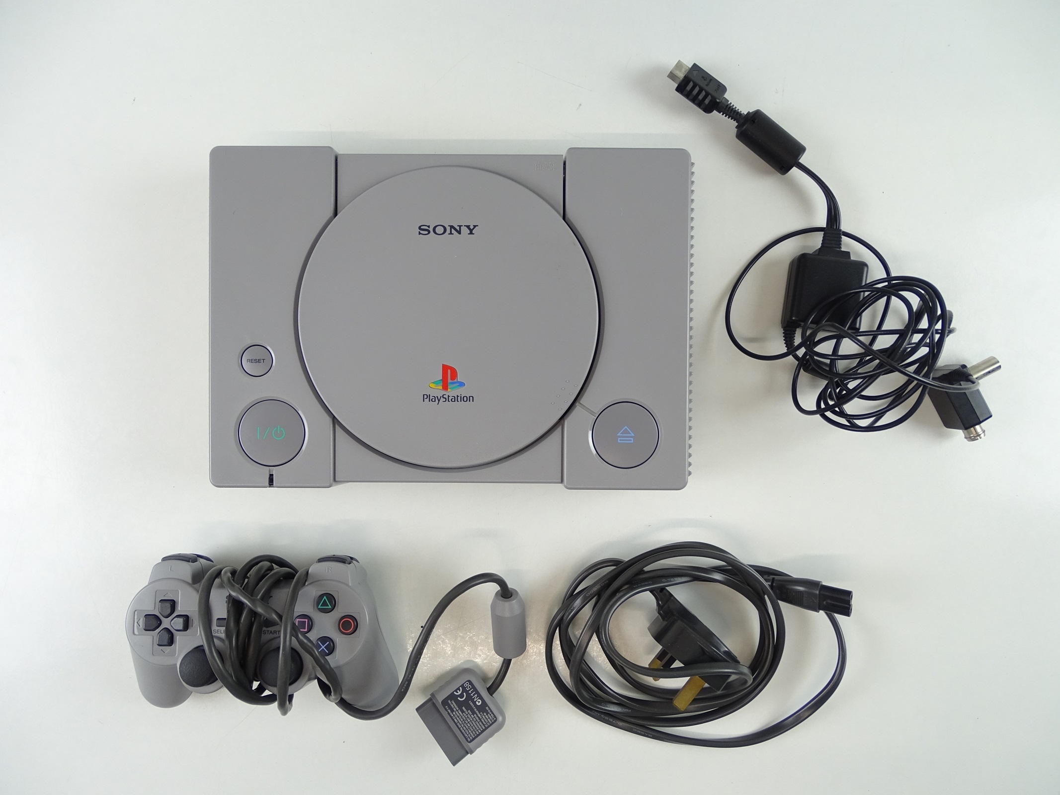 Lot 137 - Playstation original console including