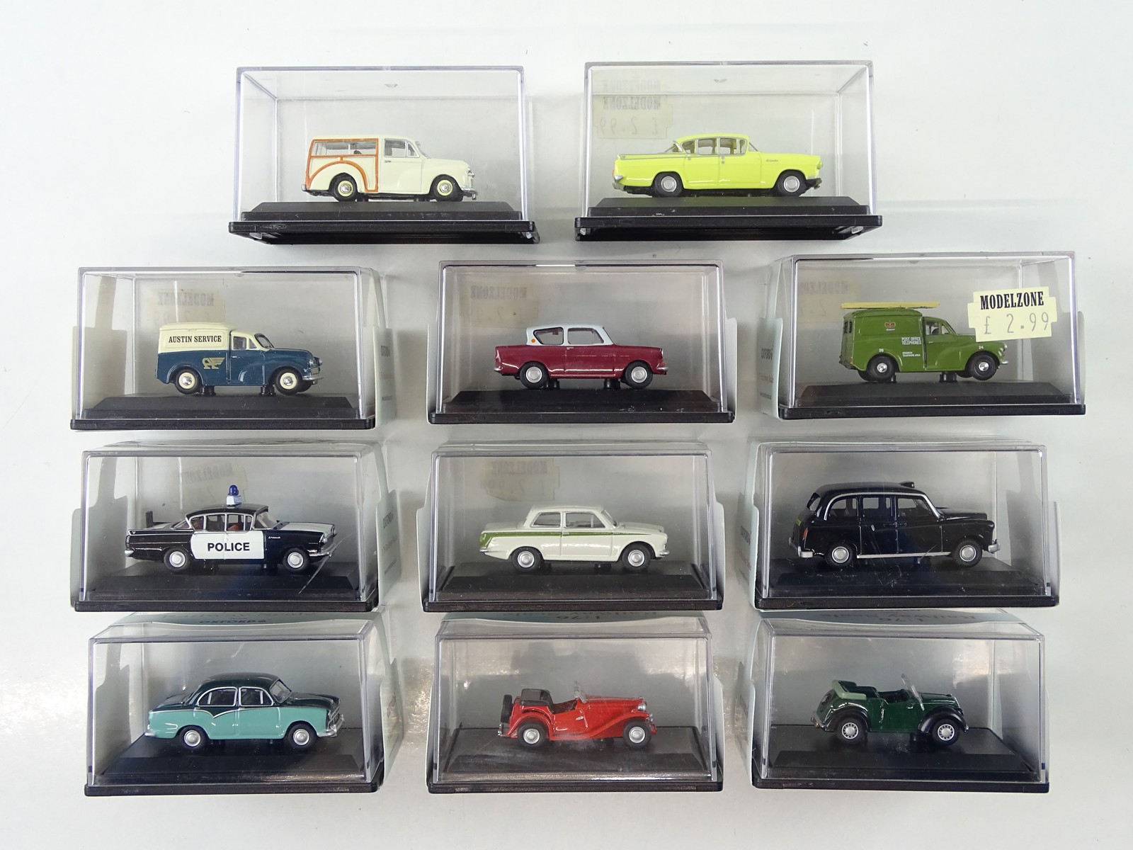 Lot 30 - A group of 1:76 scale cars and vans etc. by