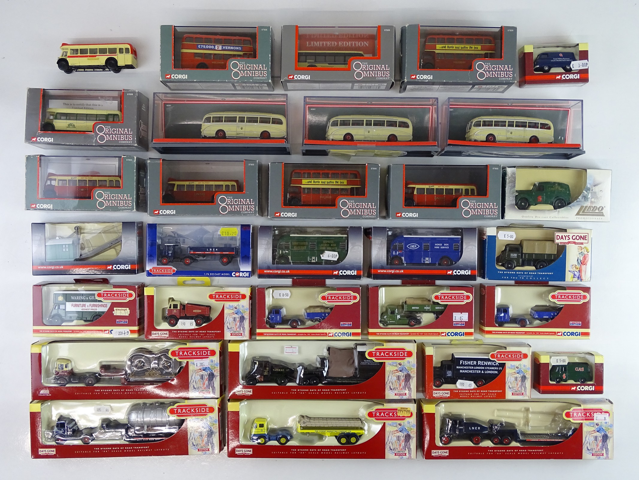 Lot 51 - A group of OO scale lorries, buses etc., from