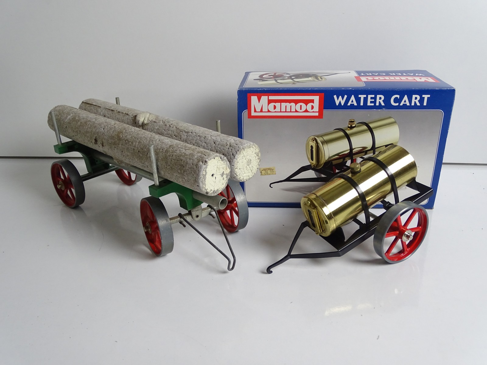 Lot 231 - An unboxed MAMOD log trailer wagon together