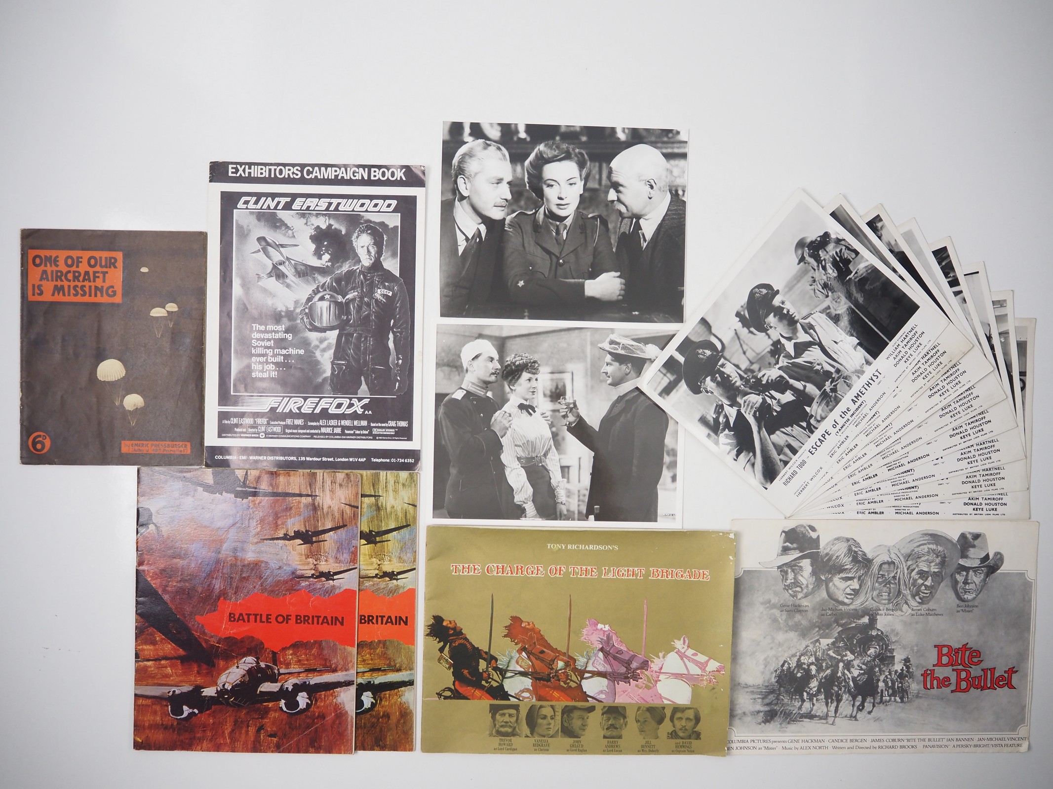 Lot 95 - A selection of mixed war film related