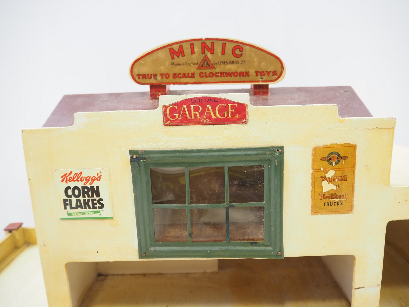 Lot 247 - A TRI-ANG MINIC wooden No.4 garage in good