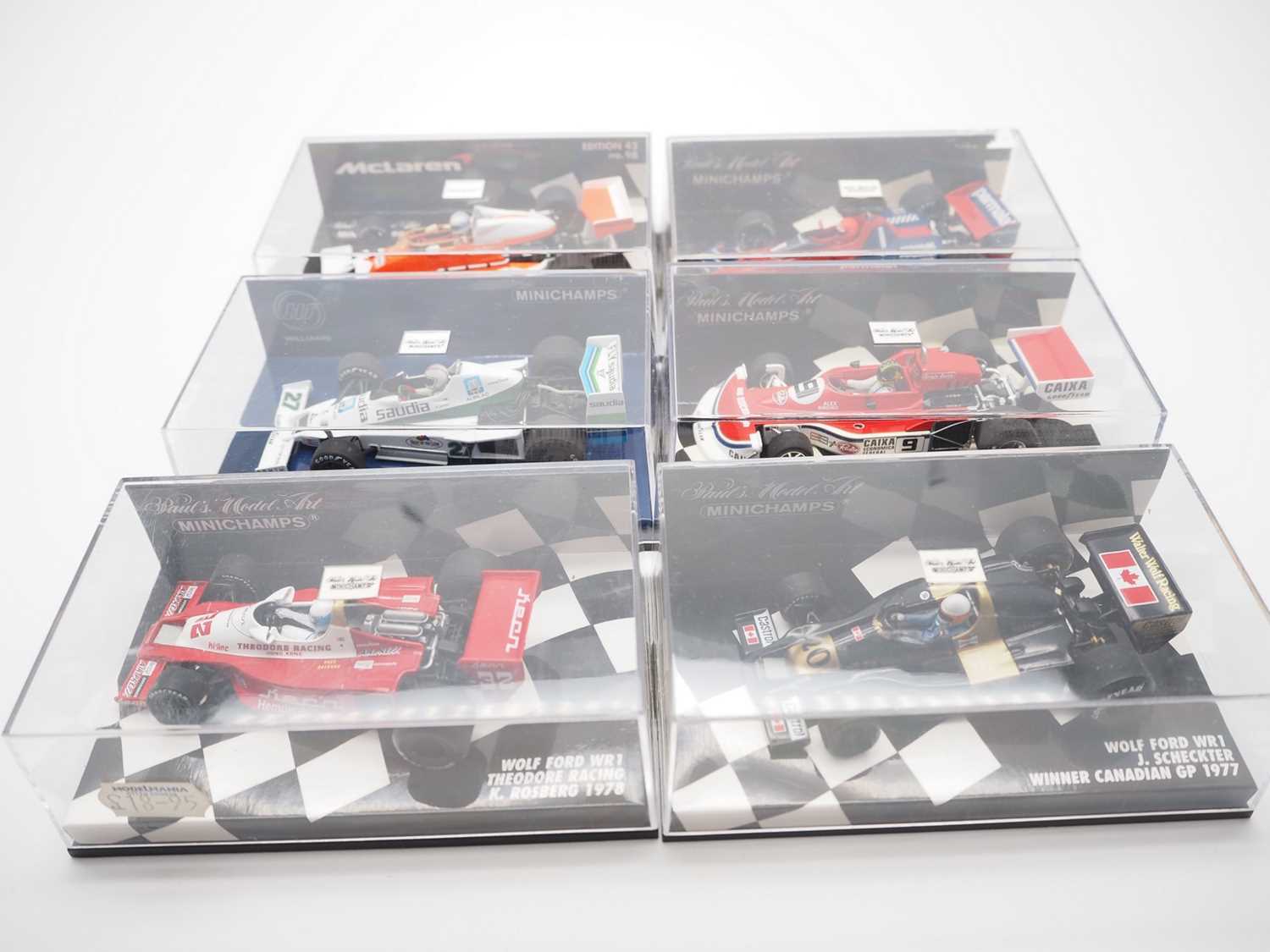 Lot 197 - A group of 1:43 scale Formula 1 race cars by