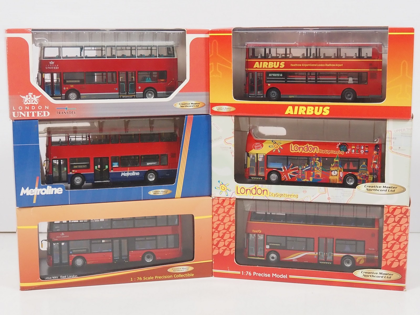 Lot 15 - A group of 1:76 scale diecast buses by