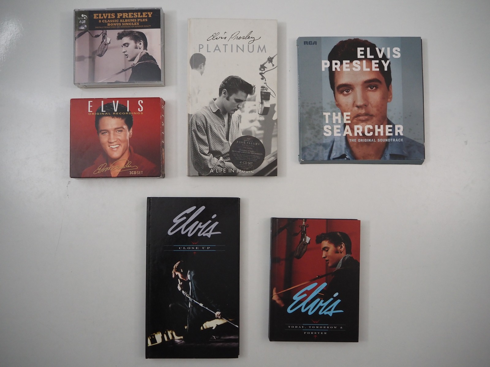 Lot 475 - A collection of six ELVIS PRESLEY CD box