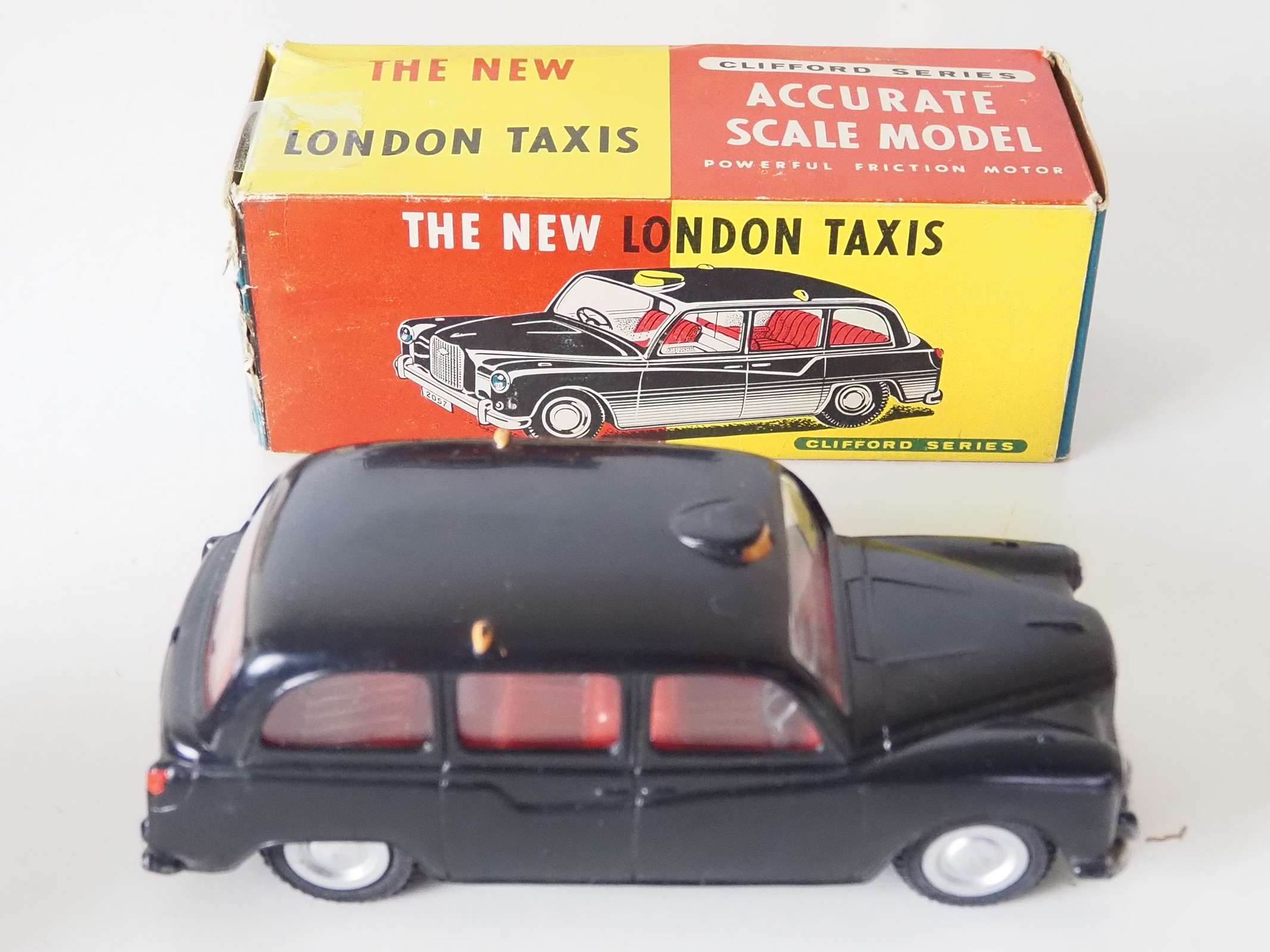 Lot 9 - A group of plastic and tin plate models of