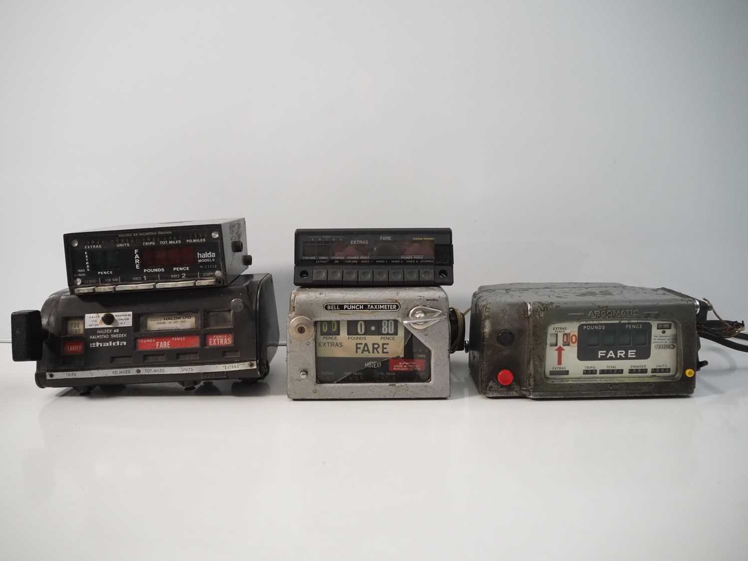 Lot 273 - A Collection of 5 vintage taxi meters; A