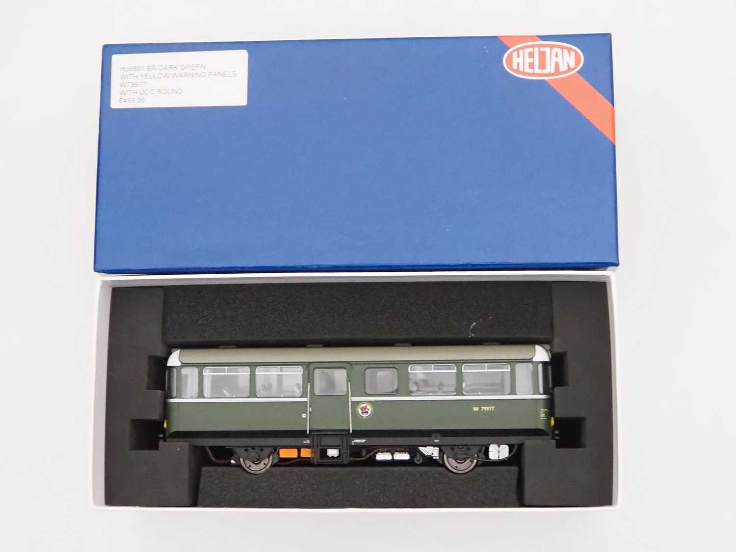 Lot 646 - A HELJAN O gauge 88911 AC Cars railbus in BR