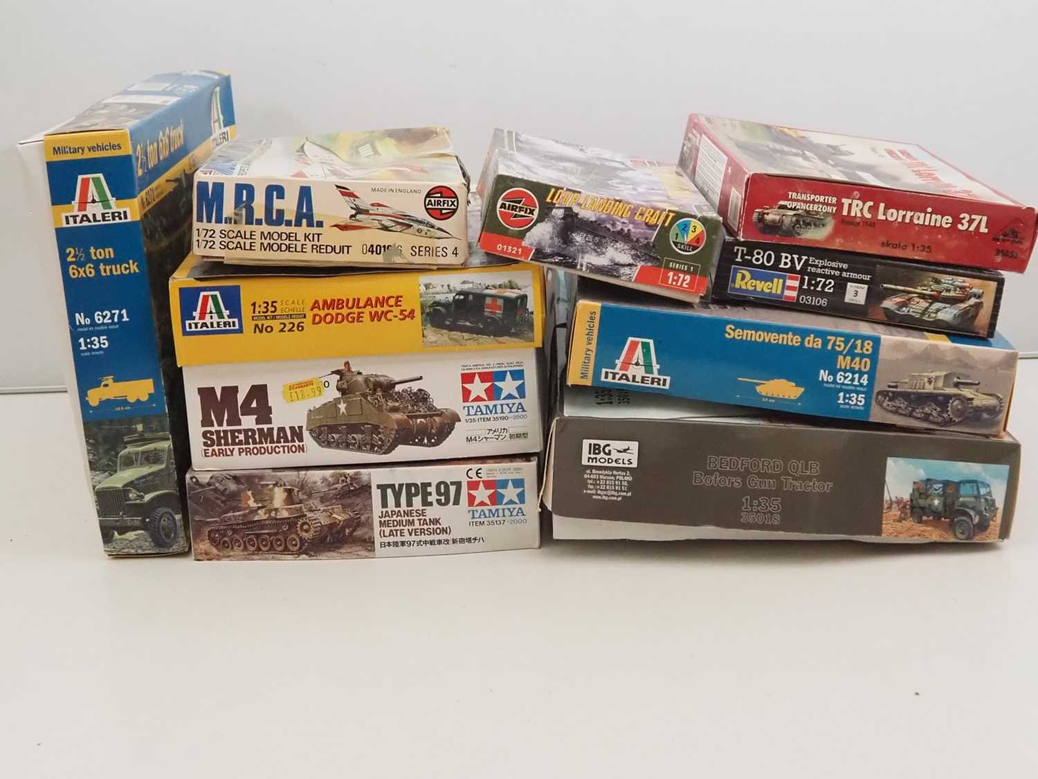 Lot 227 - A group of unbuilt plastic military vehicle