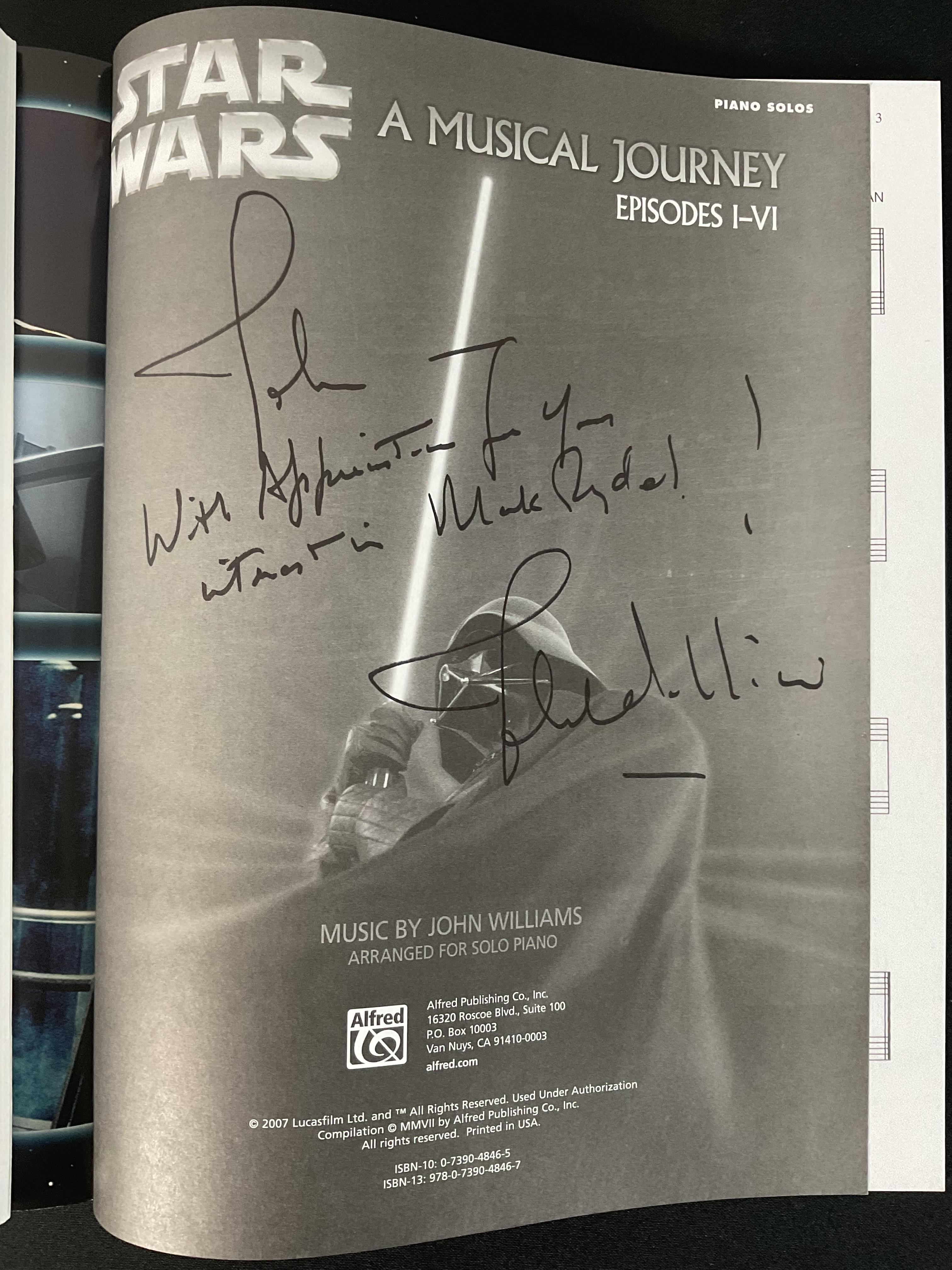 Lot 425 - A group of three JOHN WILLIAMS signed sheet