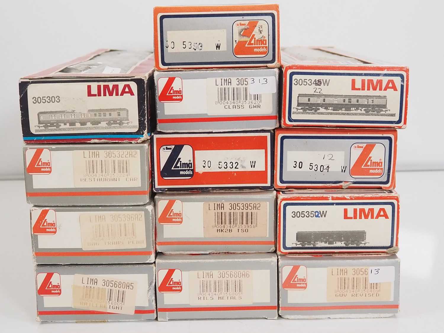 Lot 376 - A large group of LIMA OO gauge boxed coaches,