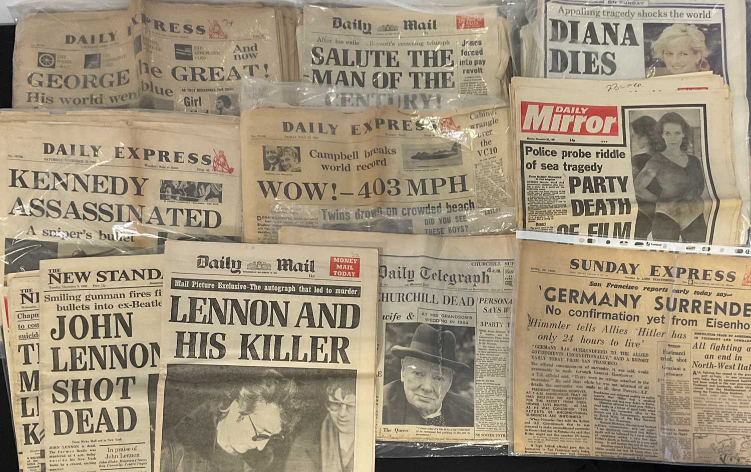 Lot 354 - A collection of vintage newspapers featuring