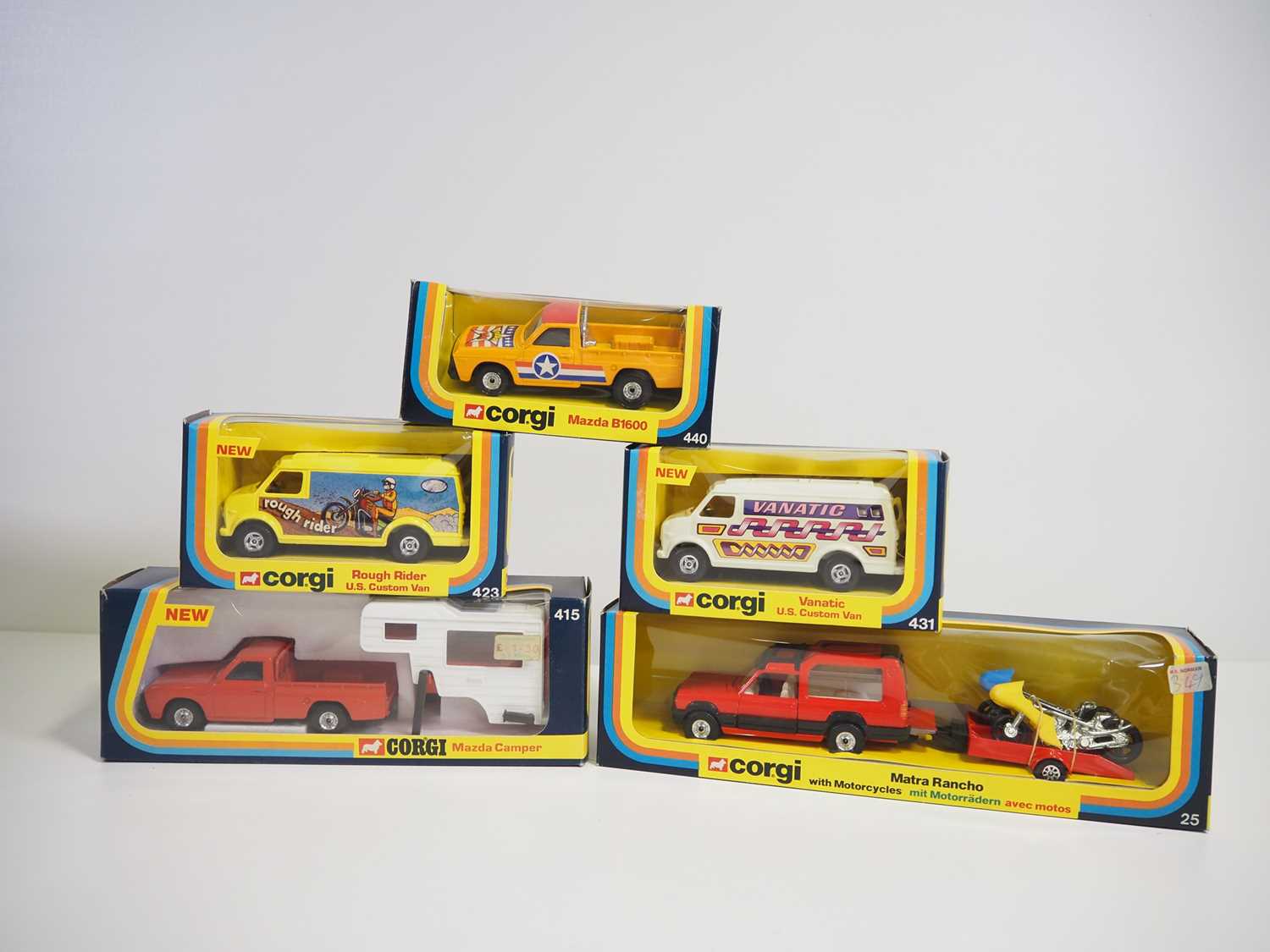Lot 162 - A group of CORGI vans and pick up trucks in