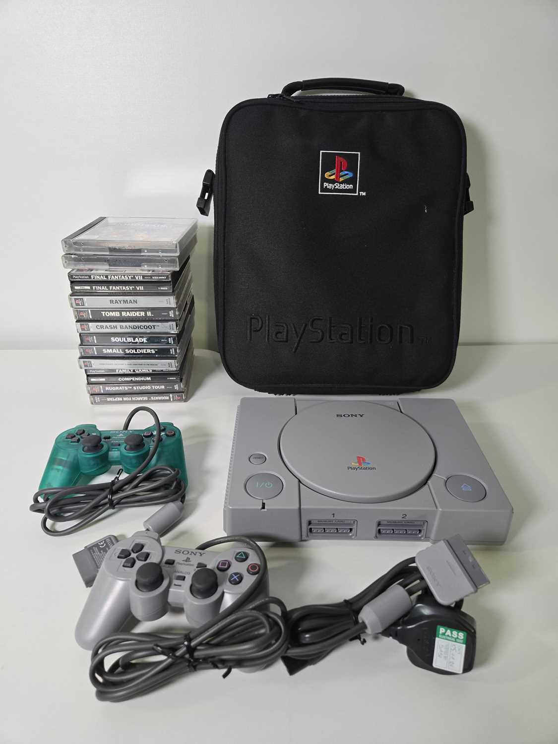 Lot 644 - A Playstation 1 console with Playstation