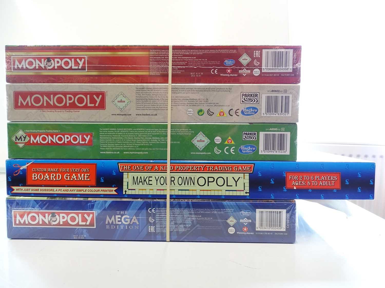 Lot 120 - A group of Monopoly sets, mostly sealed as