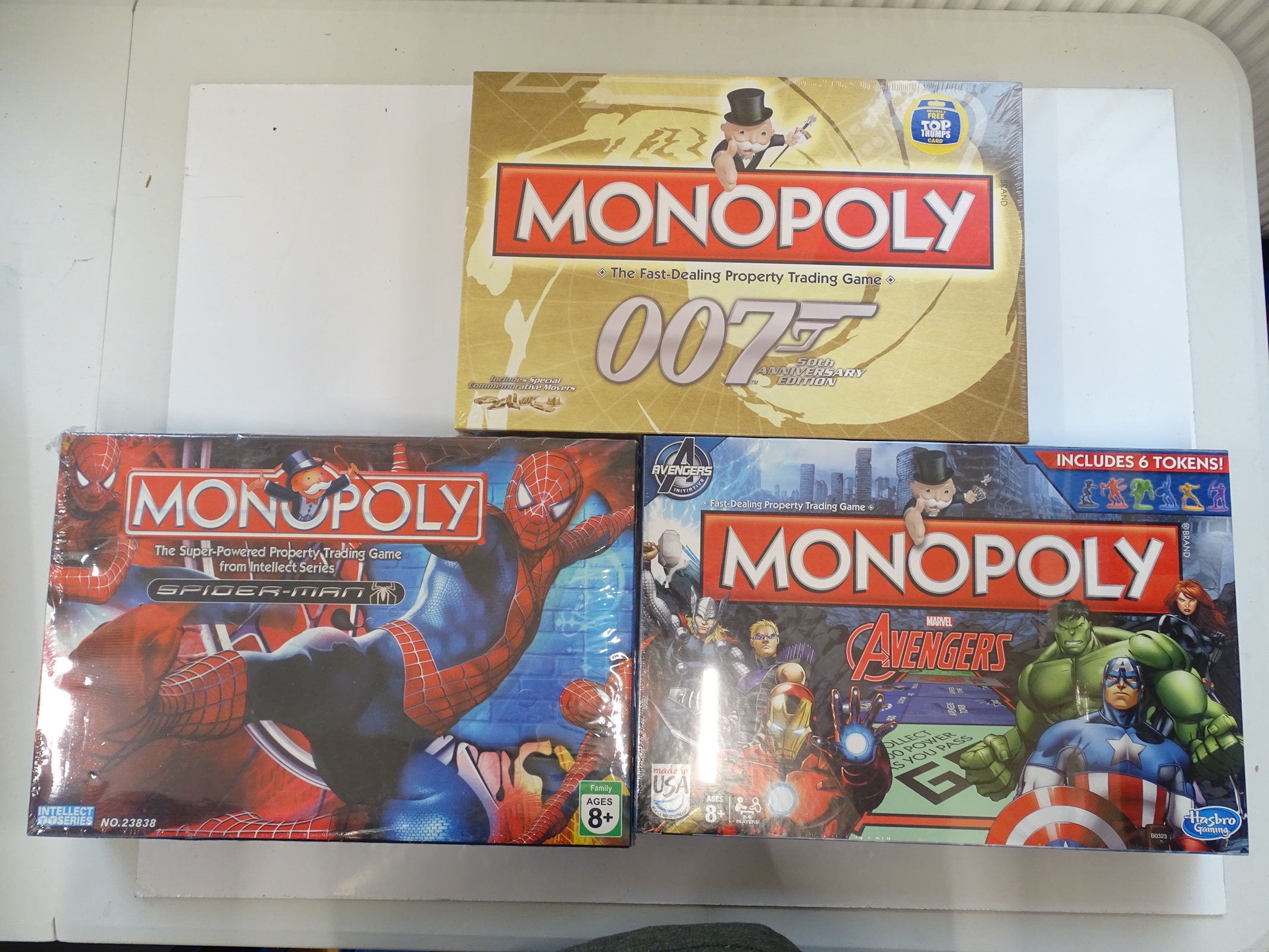 Lot 123 - A group of Monopoly sets, all sealed as new,
