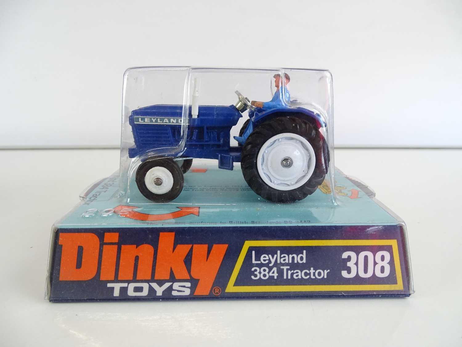 Lot 16 - A group of DINKY tractors comprising 305, 308